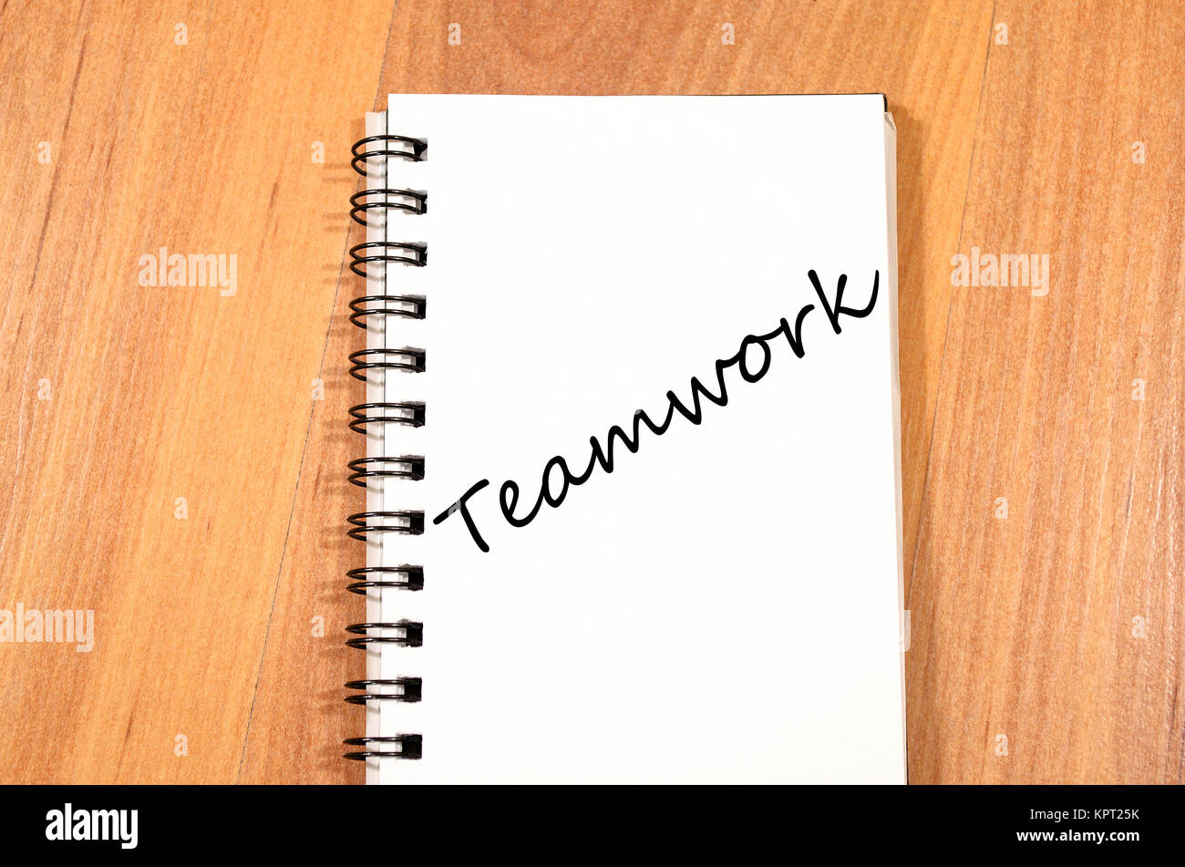 Teamwork write on notebook Stock Photo - Alamy