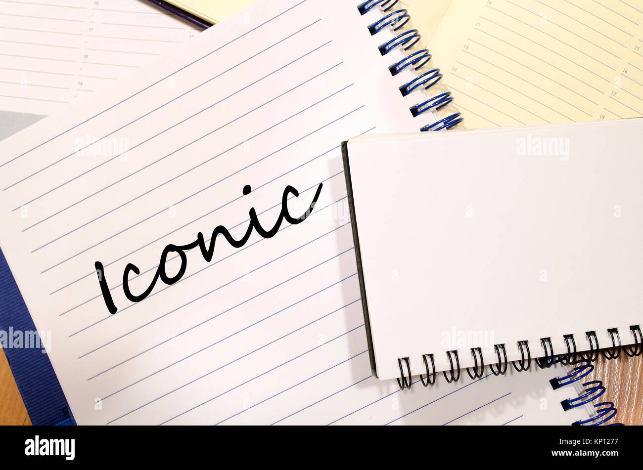Iconic write on notebook Stock Photo - Alamy
