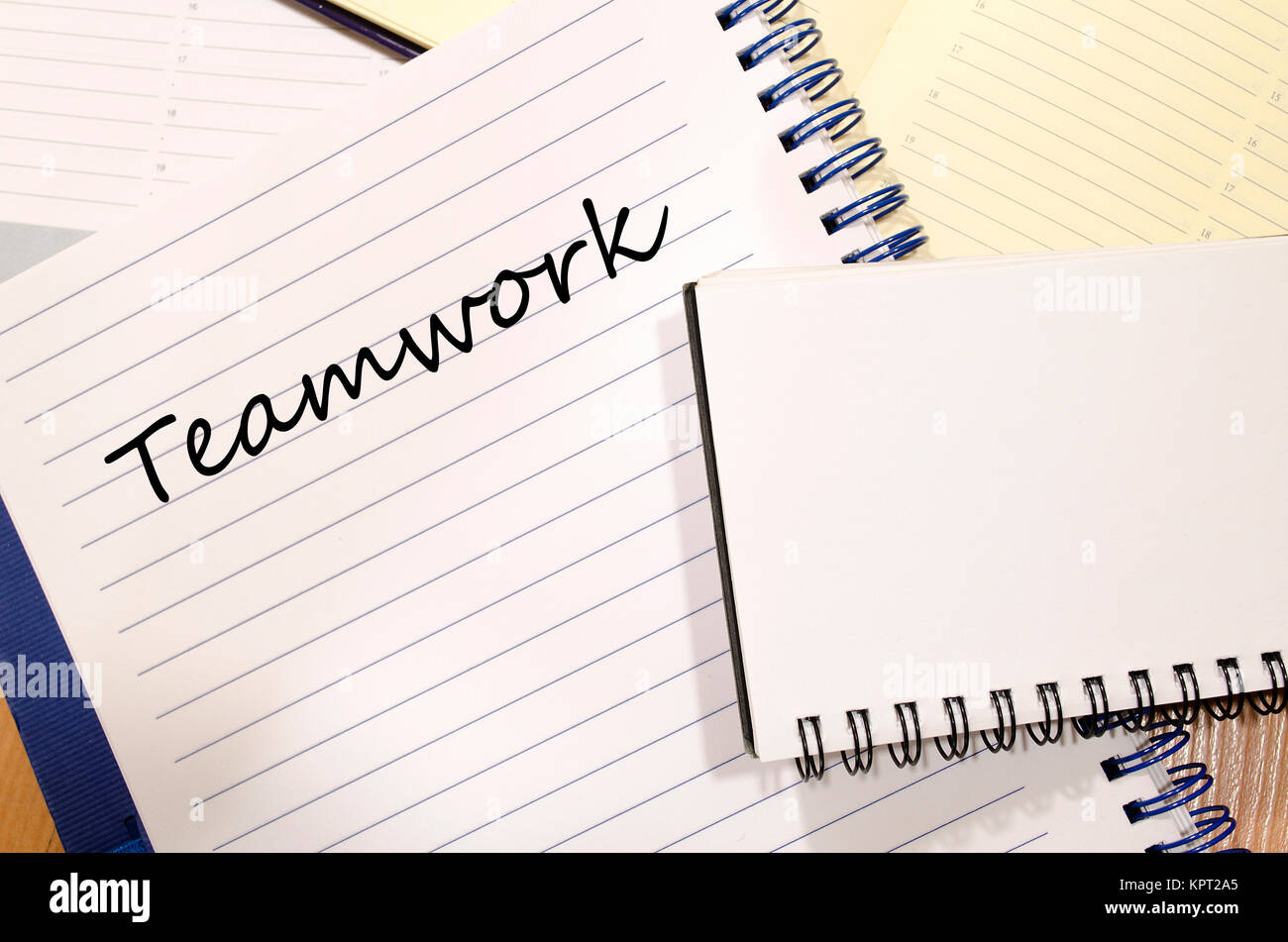 Teamwork write on notebook Stock Photo - Alamy