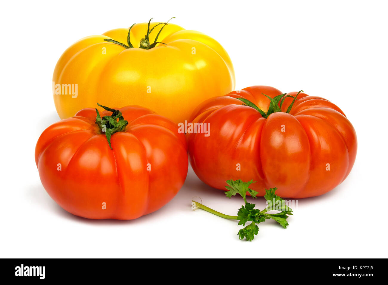 Ripe red and yellow tomatoes Stock Photo - Alamy