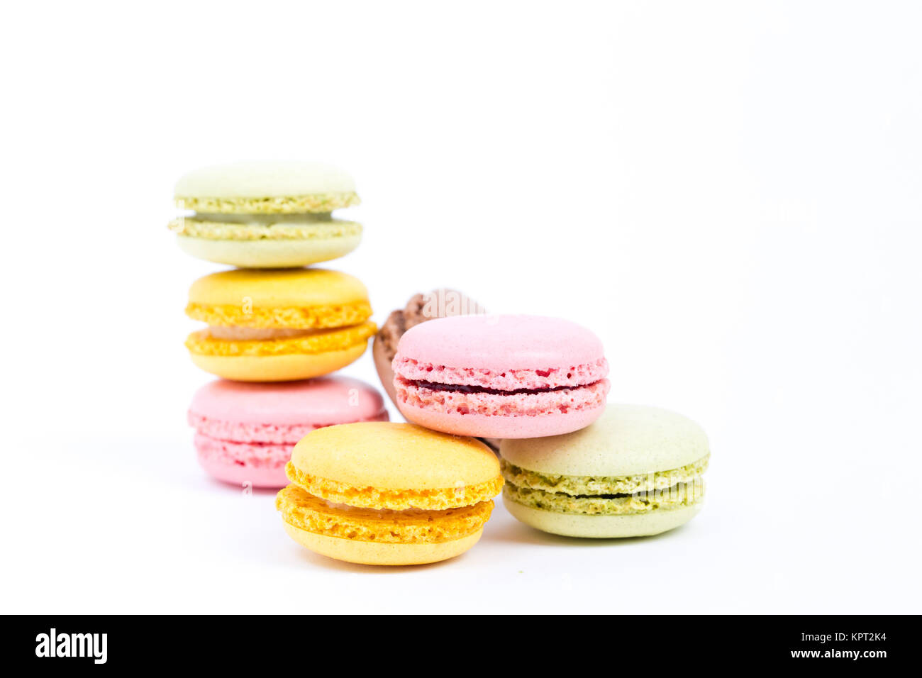 some sweet colorful biscuits against white background Stock Photo - Alamy