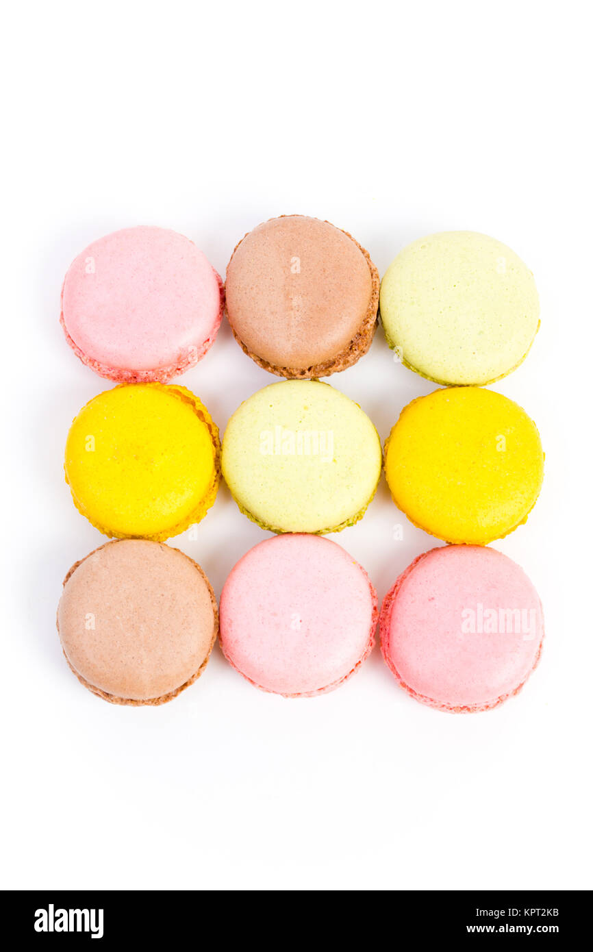 some sweet colorful biscuits against white background Stock Photo - Alamy