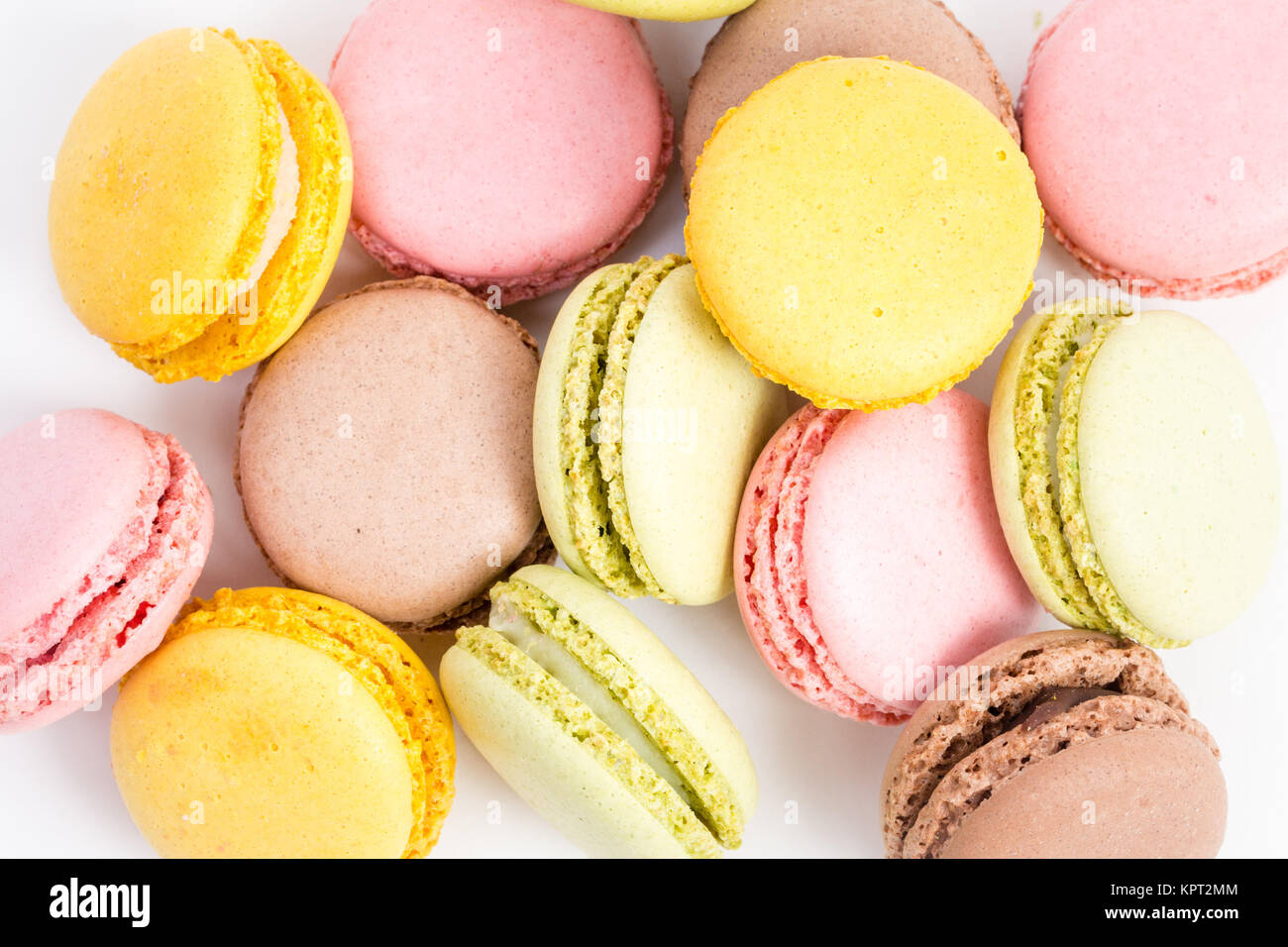 some sweet colorful biscuits against white background Stock Photo - Alamy