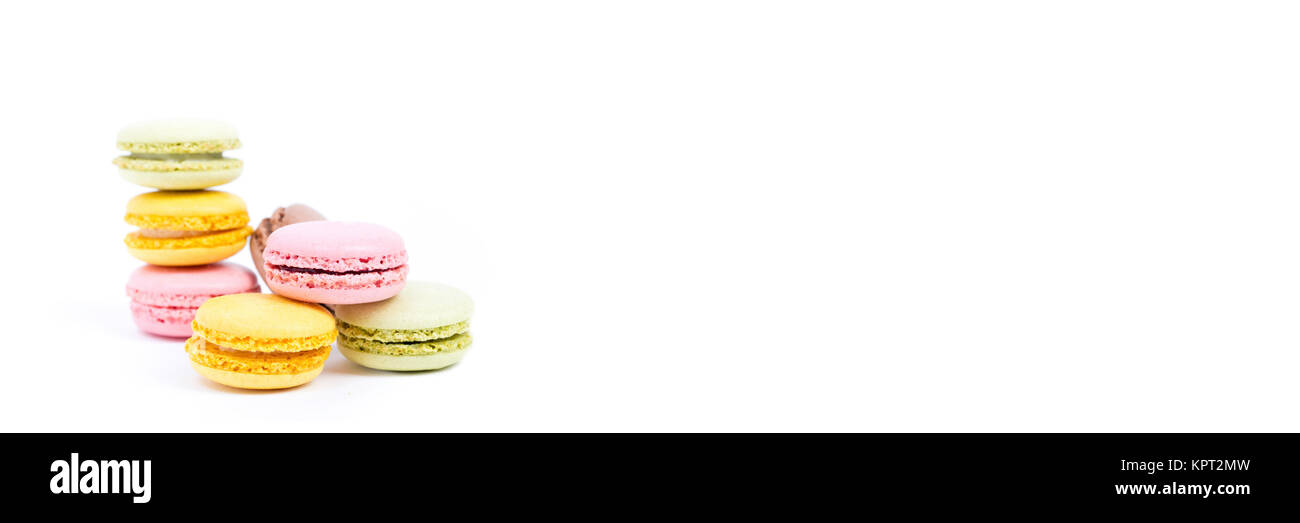 some sweet colorful biscuits against white background Stock Photo - Alamy