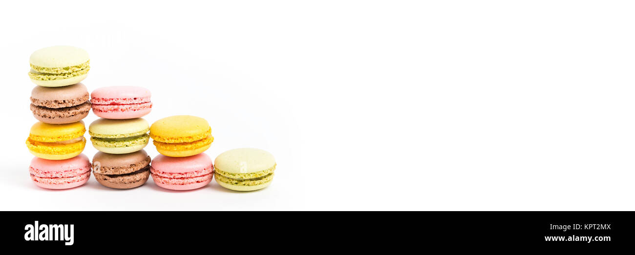 some sweet colorful biscuits against white background Stock Photo - Alamy