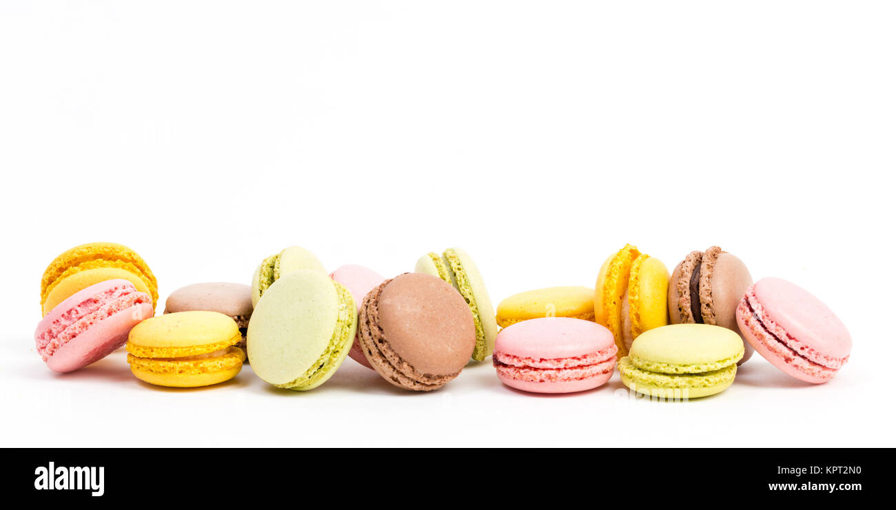 some sweet colorful biscuits against white background Stock Photo - Alamy