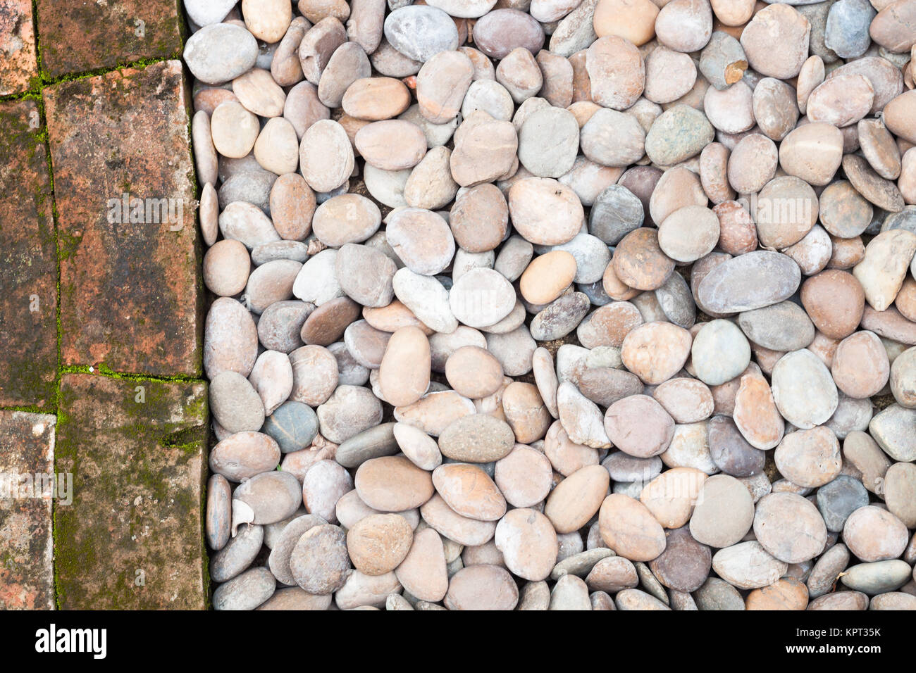 Pebble stones and bricks abstract background, stock photo Stock Photo ...