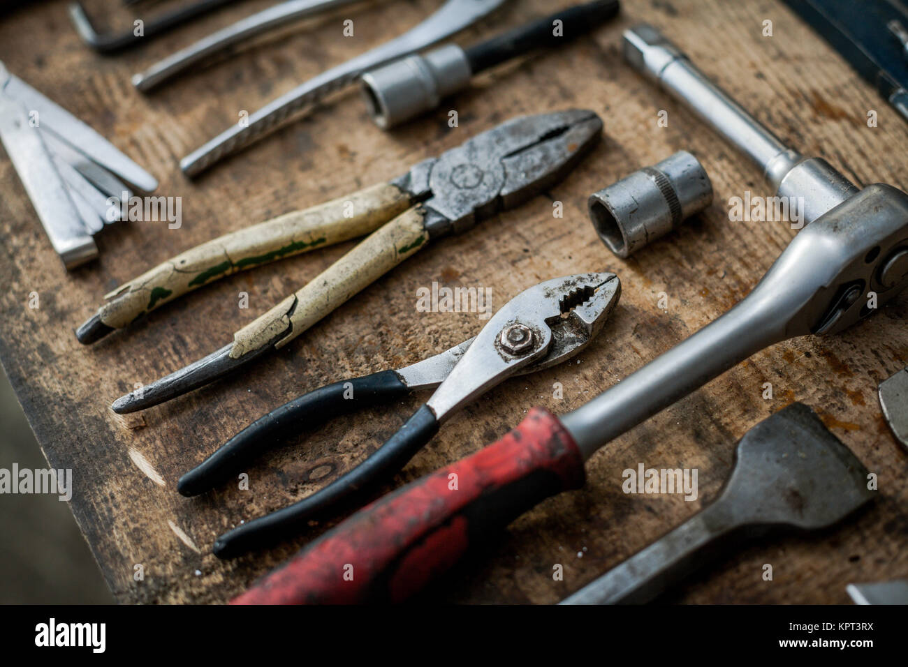 Color image of many tools on a wooden plank Stock Photo - Alamy