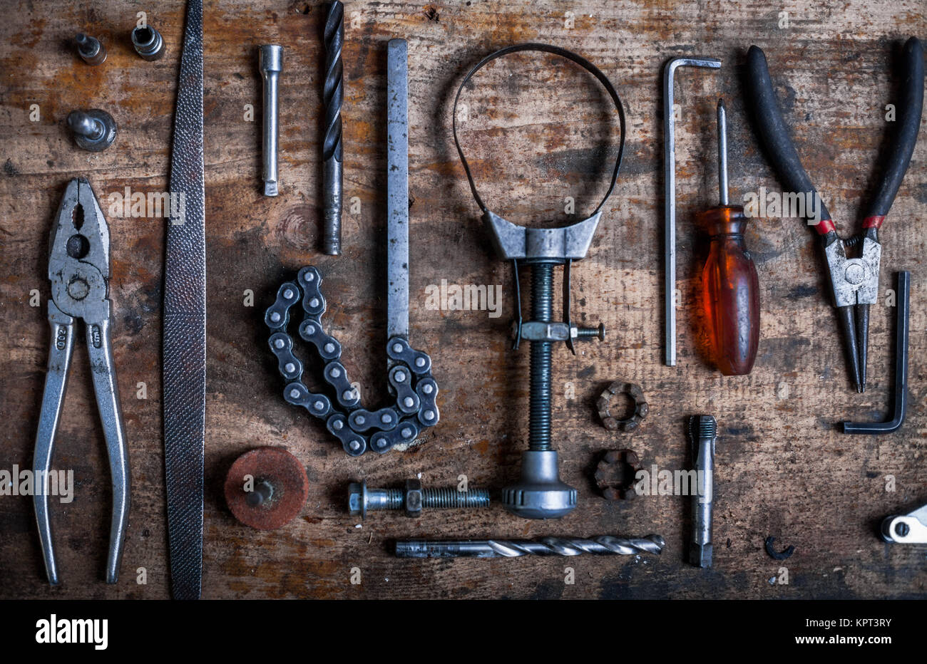 Color image of many tools on a wooden plank Stock Photo - Alamy