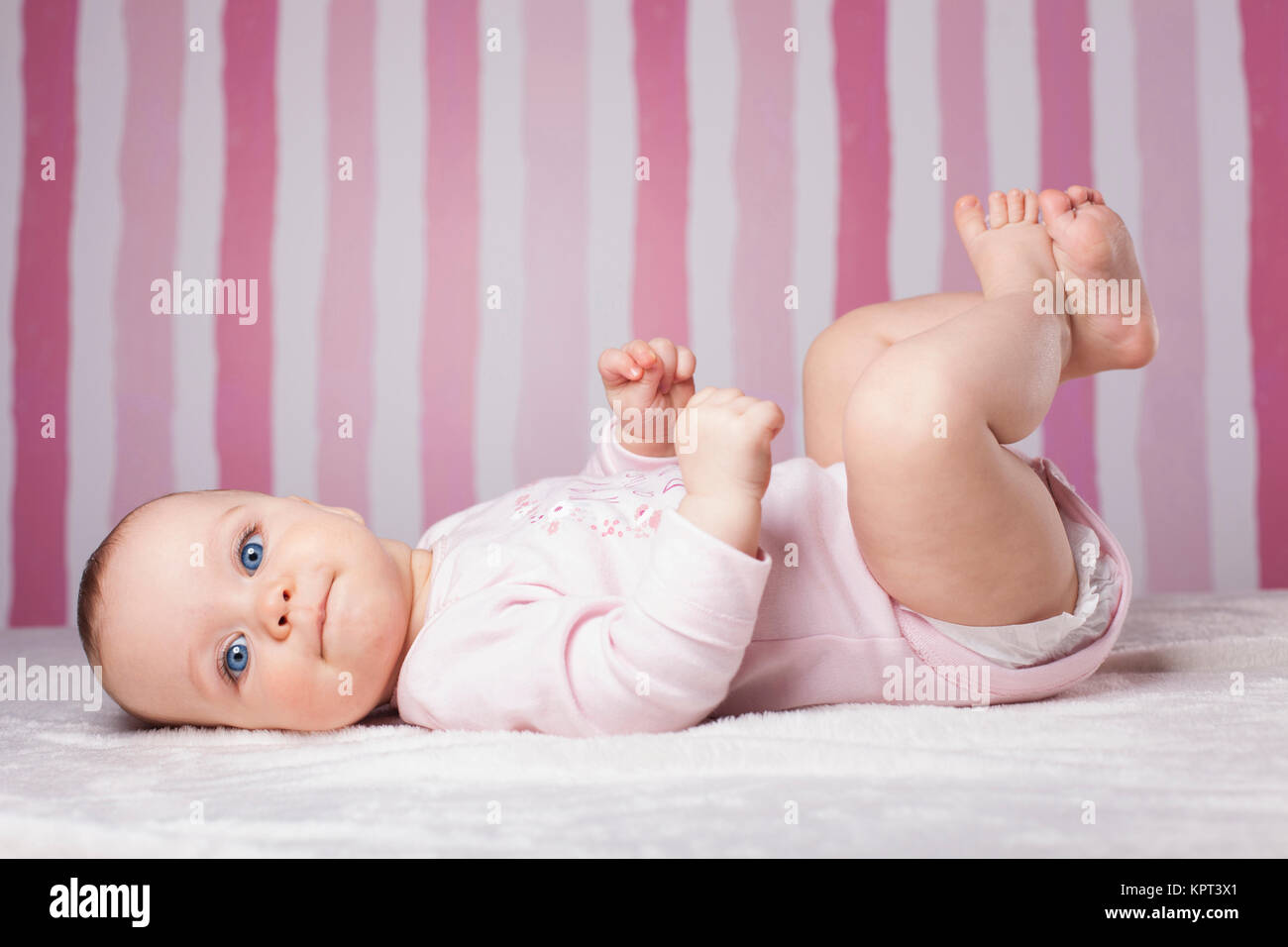 Young girl. Beautiful infant portrait on colorful background Stock ...