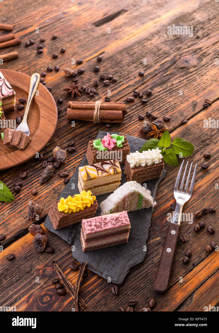 Different sort of small sweet cakes Stock Photo - Alamy