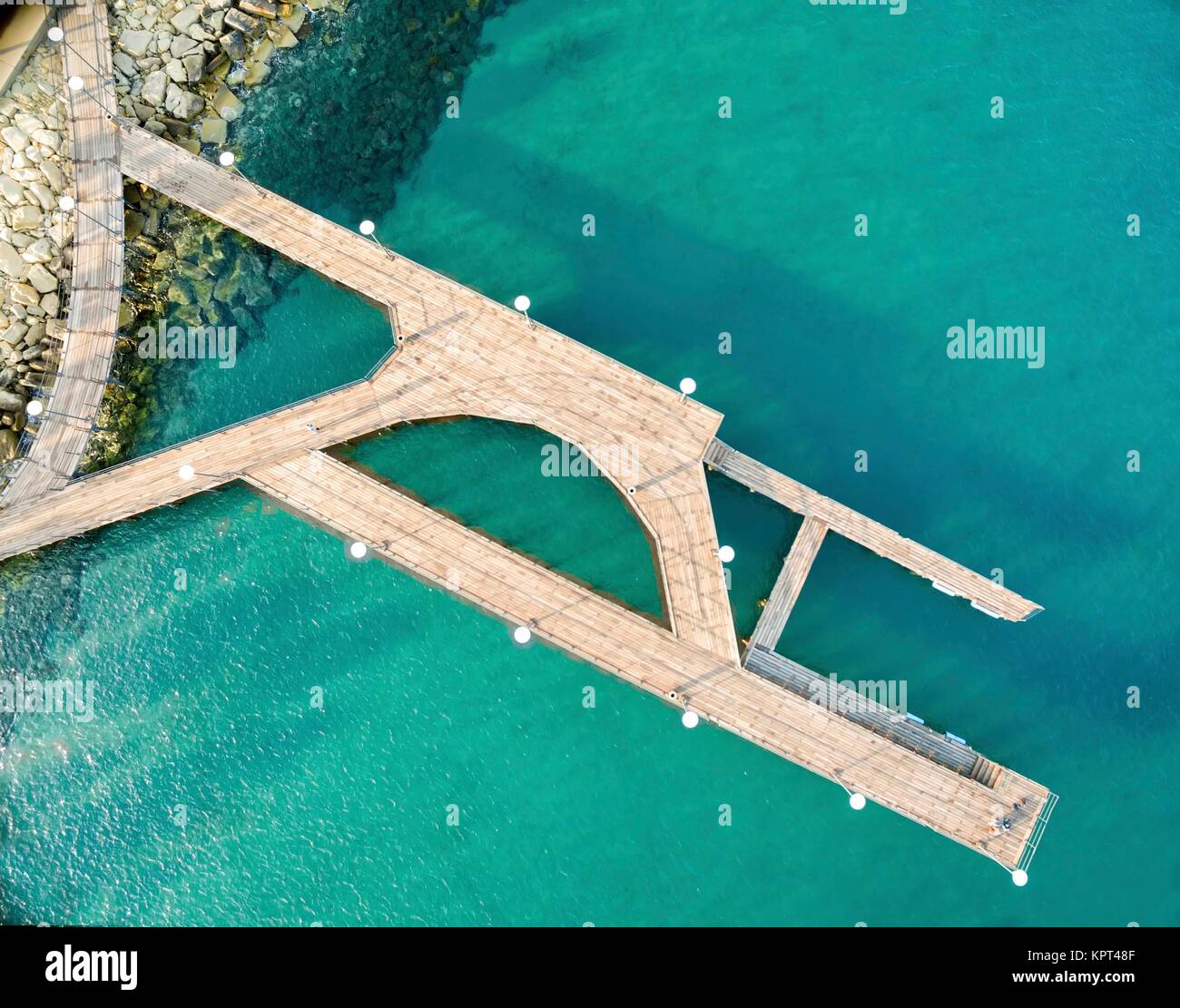 Aerial view of Molos Promenade pier on the coast of Limassol city in ...