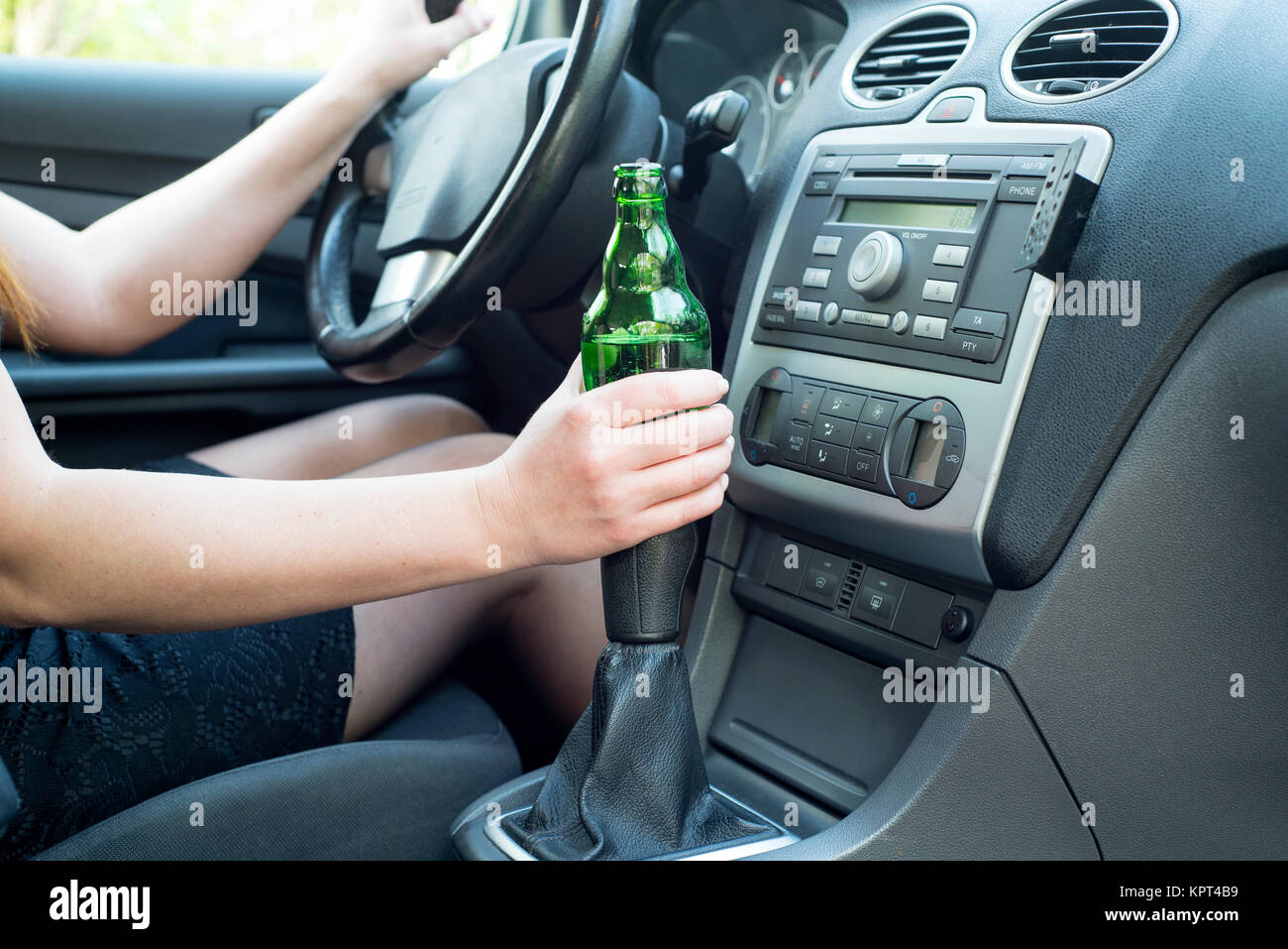 picture of woman drinking alcohol in the car Stock Photo - Alamy