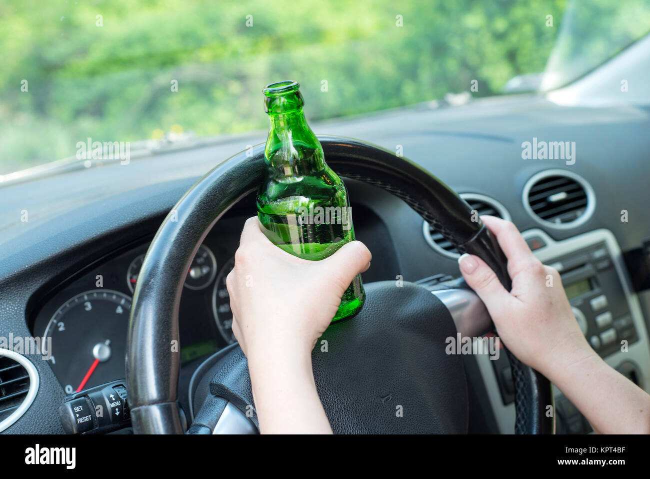 picture of woman drinking alcohol in the car Stock Photo - Alamy