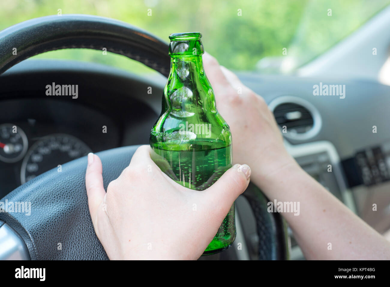 picture of woman drinking alcohol in the car Stock Photo - Alamy