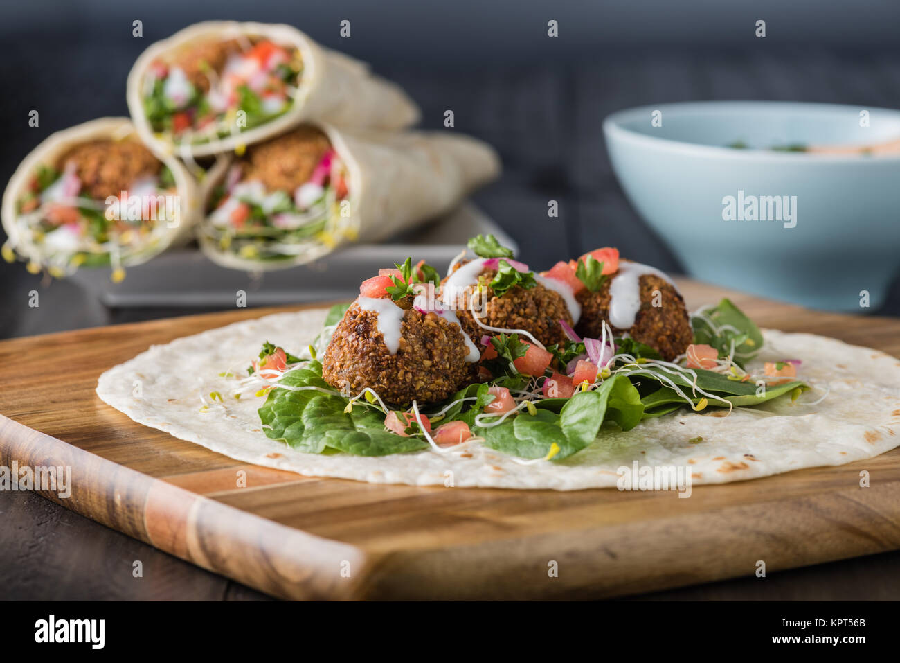 Vegan Falafel Wrap With Salsa and salad Stock Photo - Alamy