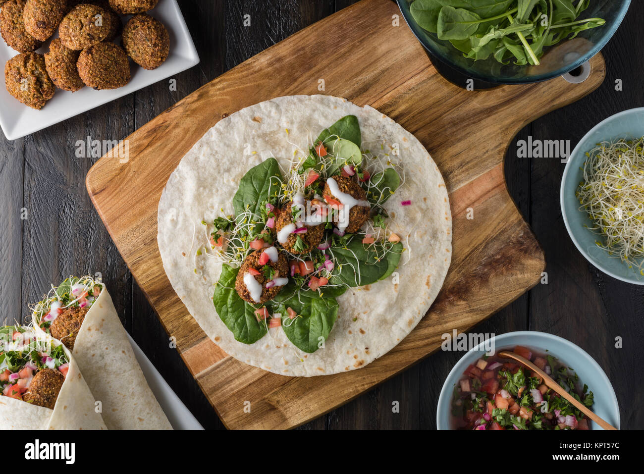 Vegan Falafel Wrap With Salsa and salad Stock Photo - Alamy