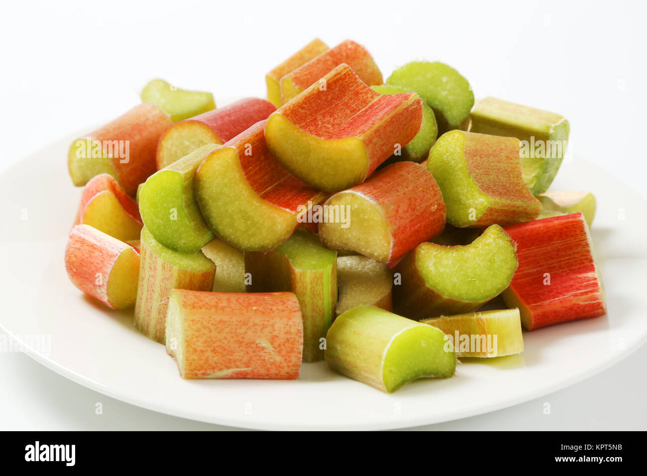 fresh rhubarb stalks cut into pieces Stock Photo - Alamy