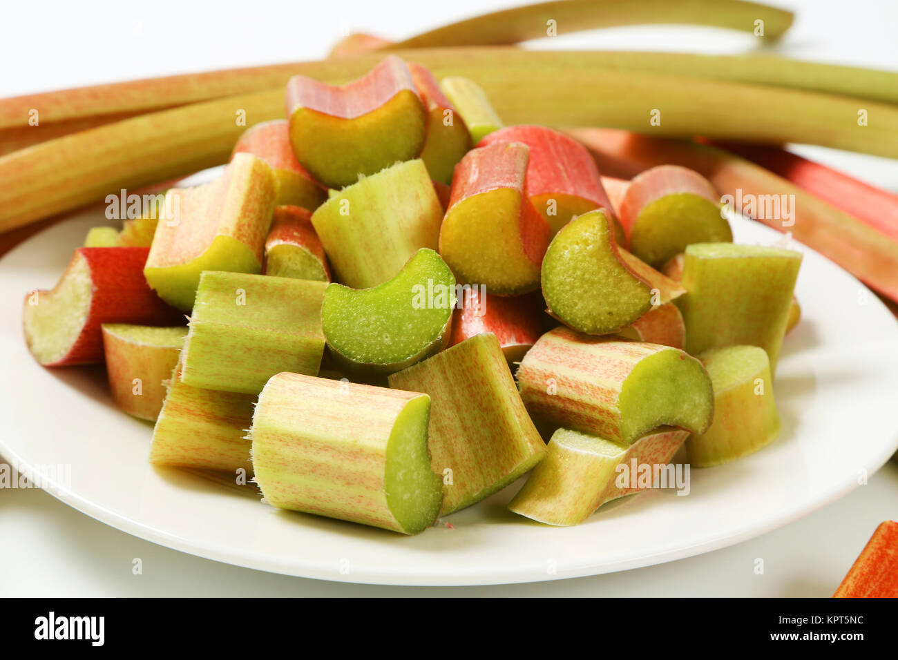 fresh rhubarb stalks cut into pieces Stock Photo - Alamy