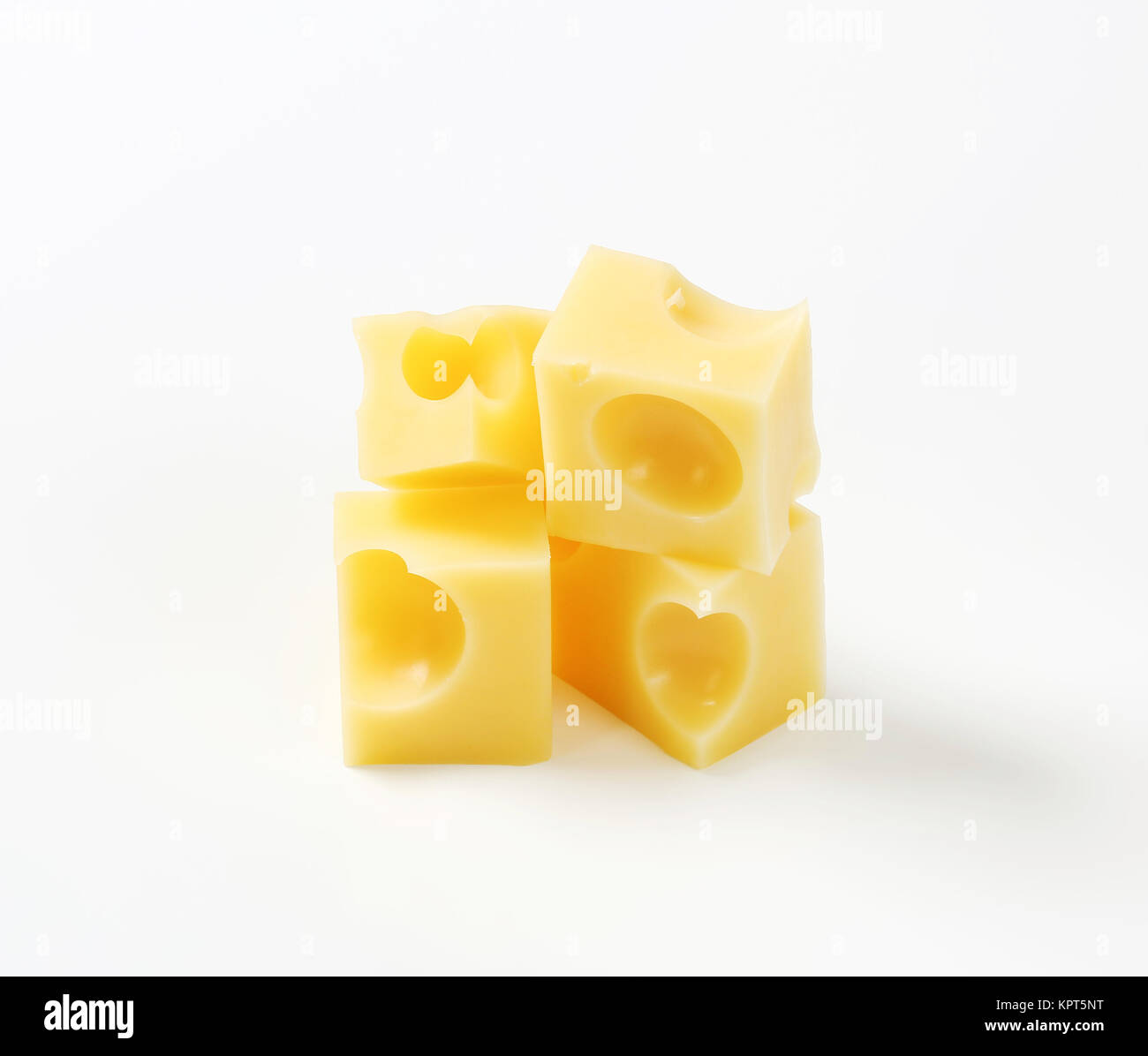 cubes of fresh emmental cheese on white background Stock Photo - Alamy