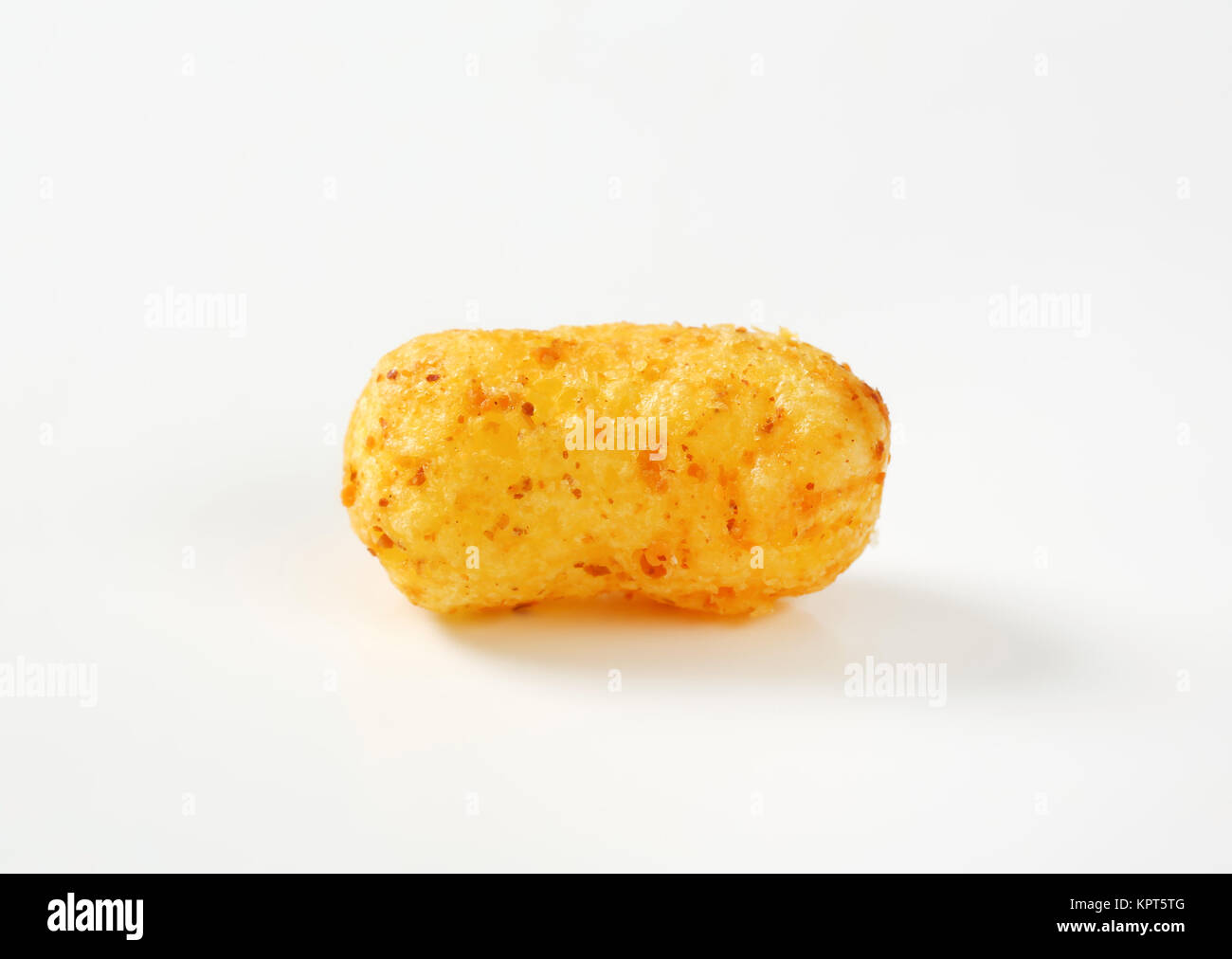 single peanut puff on white background Stock Photo - Alamy