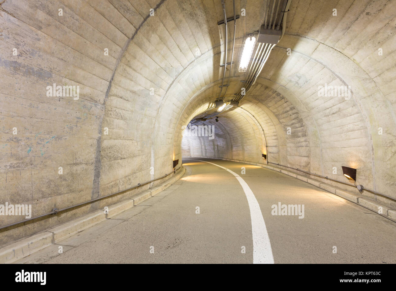 Interior of an urban walkway tunnel road Stock Photo - Alamy