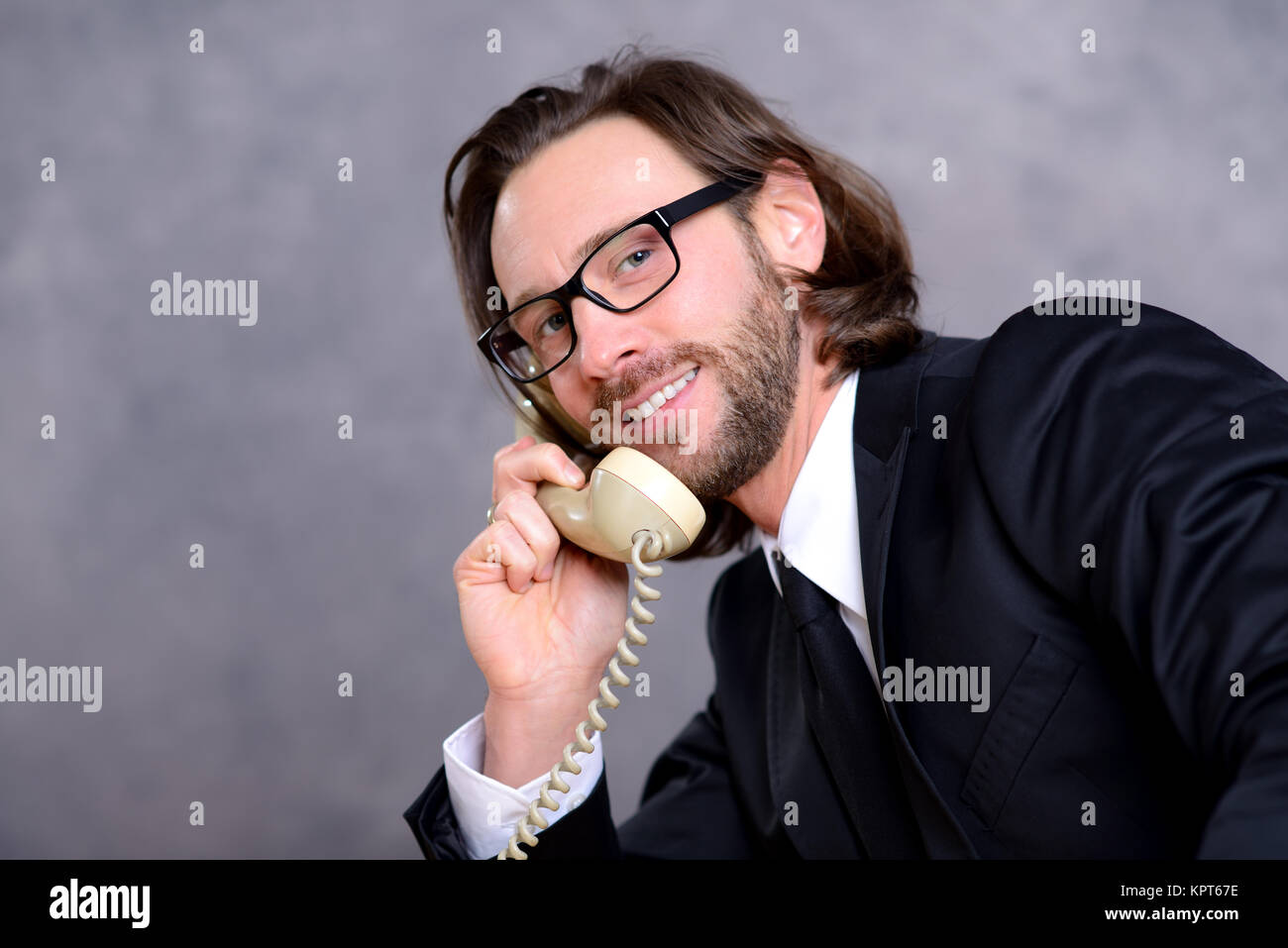 businessman has a good,phonecall Stock Photo - Alamy
