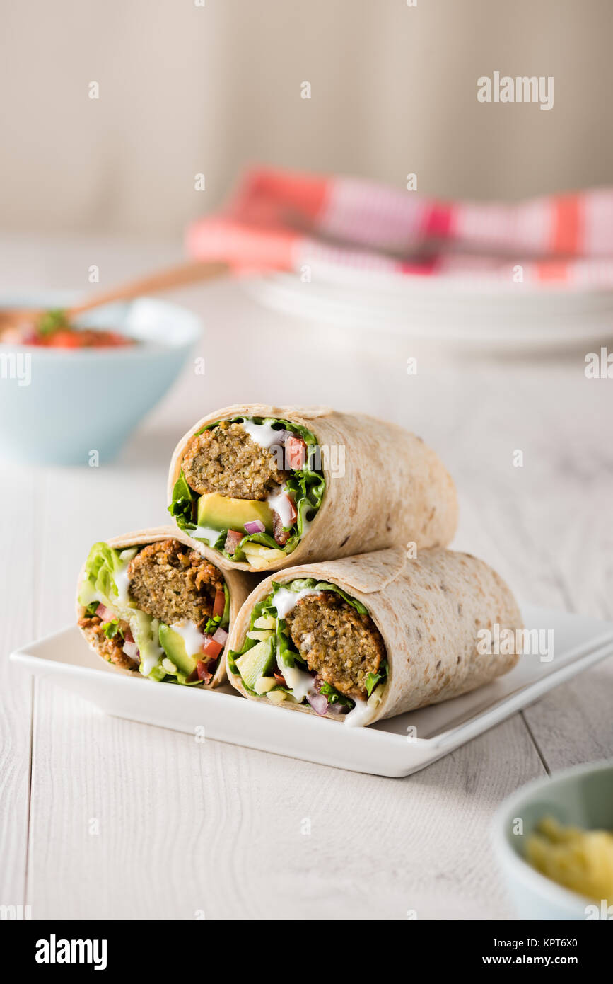 Vegetarian falafel wraps with avocado and cheese Stock Photo - Alamy