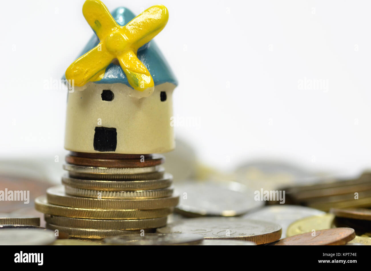 Mortgage concept by money house from coins Stock Photo - Alamy