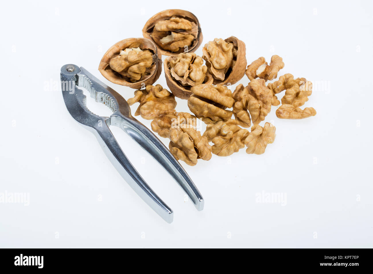 cracked walnut isolated on the white background Stock Photo - Alamy