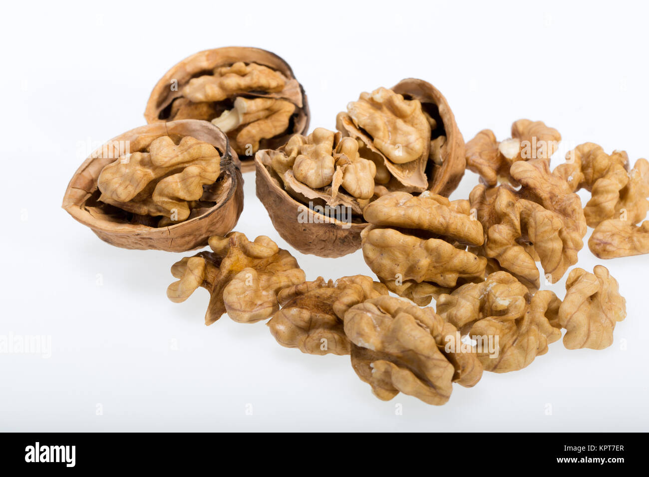 cracked walnut isolated on the white background Stock Photo - Alamy
