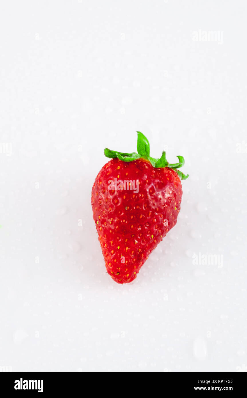 Closeup of strawberry with dew drops on white background Stock Photo ...