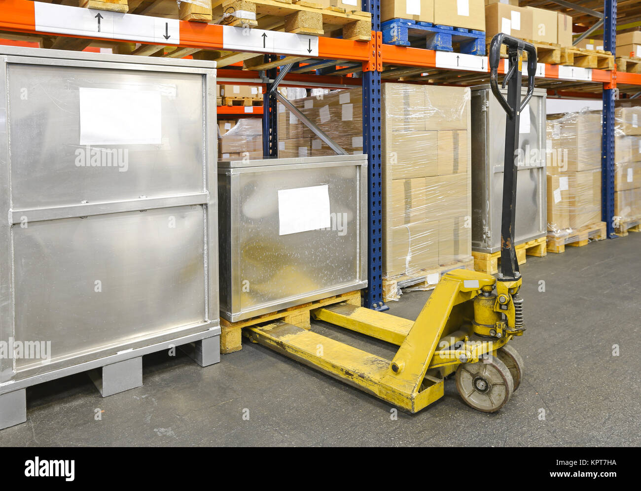 Pallet Jack Truck in Distribution Warehouse Stock Photo - Alamy