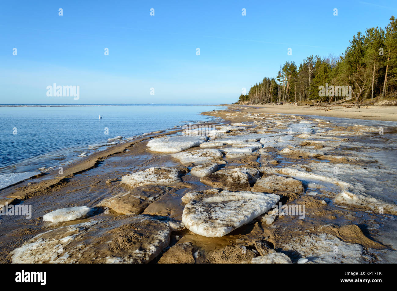 frozen beach in cold winters day with colorful sky and ice Stock Photo ...