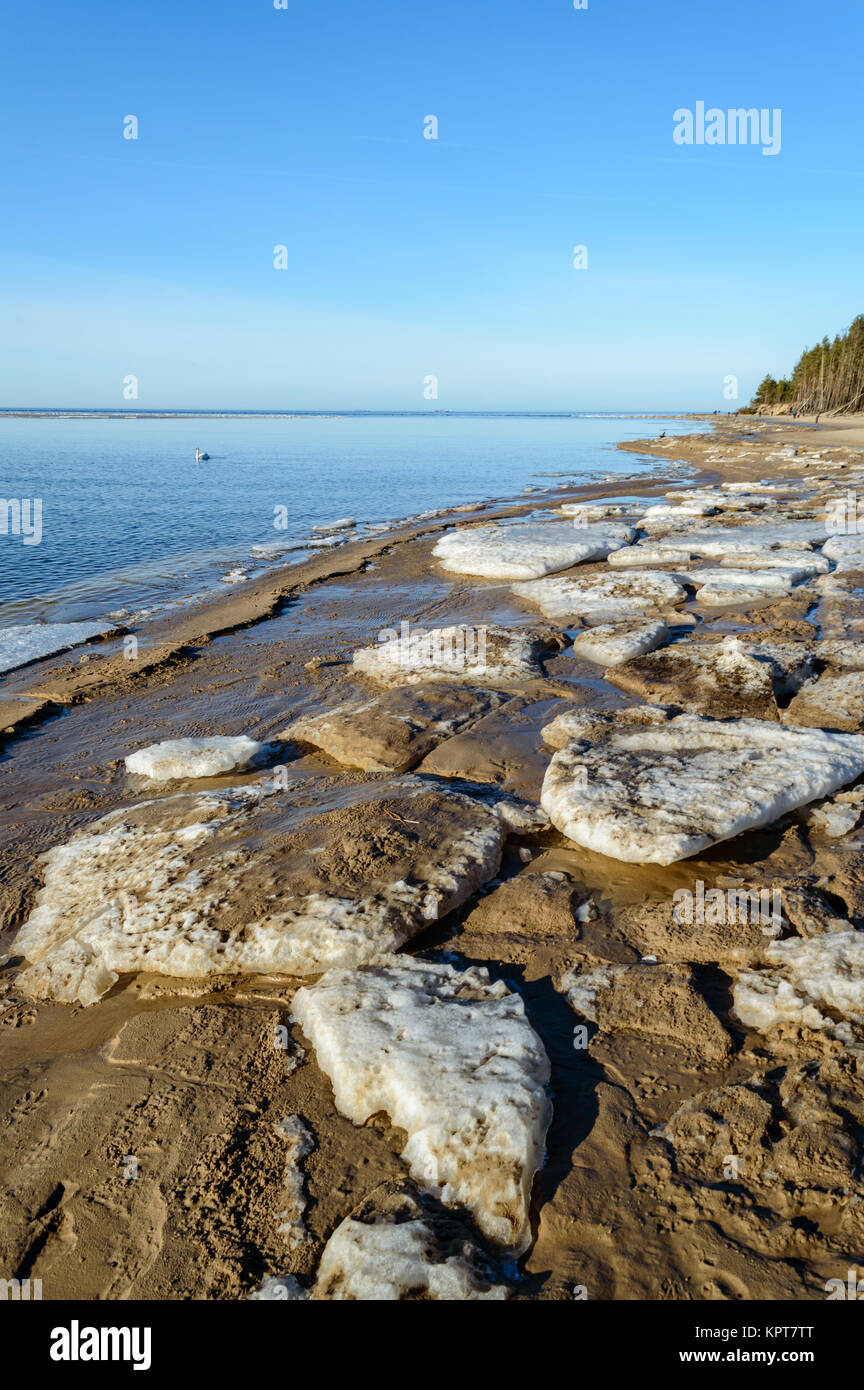 frozen beach in cold winters day with colorful sky and ice Stock Photo ...