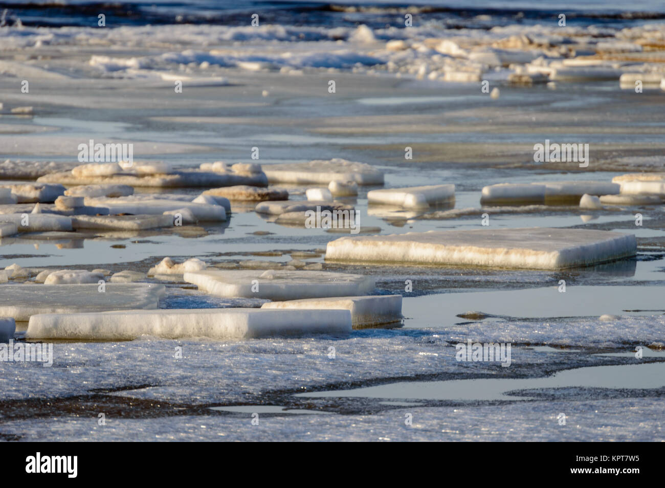 frozen beach in cold winters day with colorful sky and ice Stock Photo ...