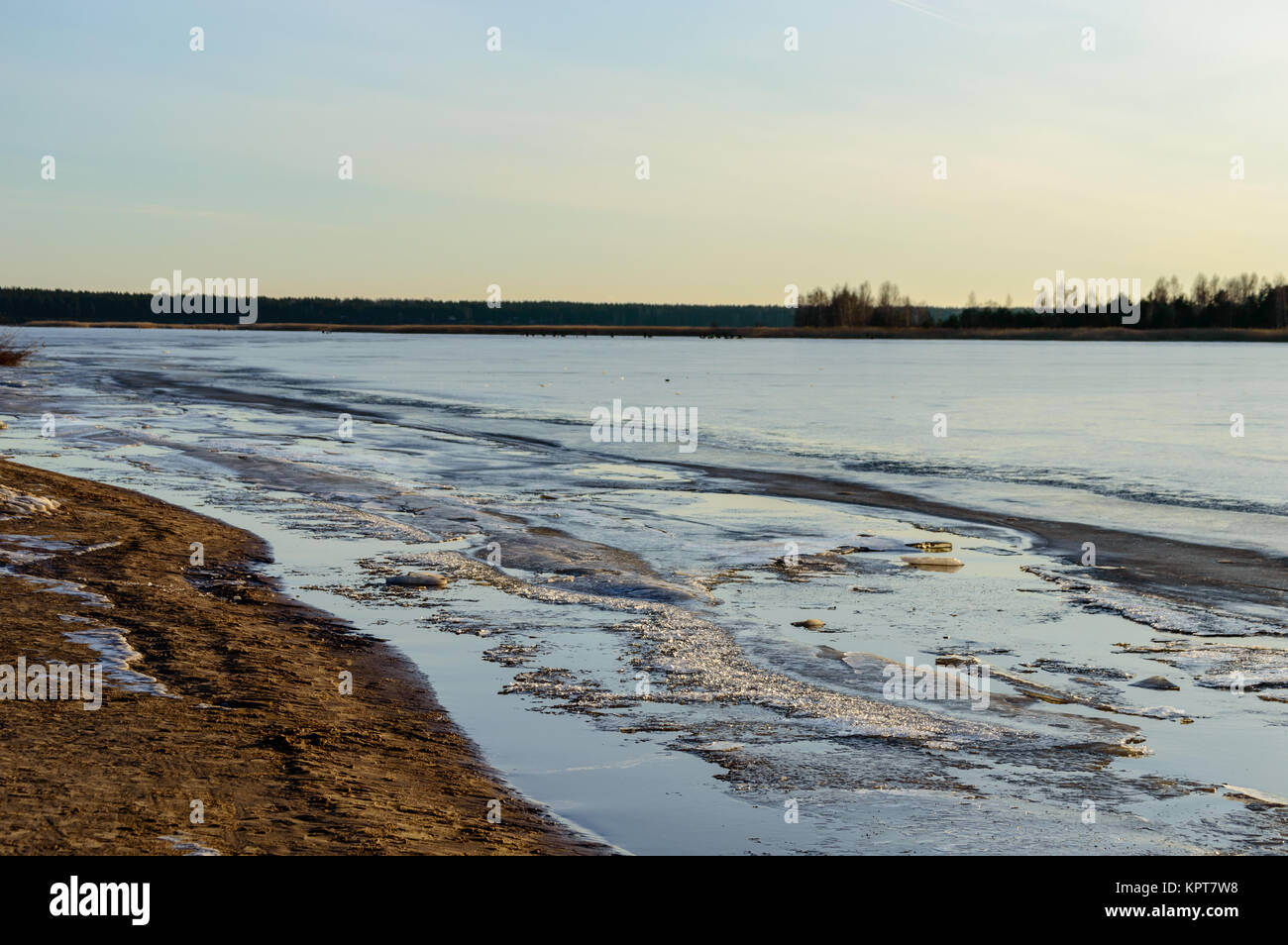 frozen beach in cold winters day with colorful sky and ice Stock Photo ...