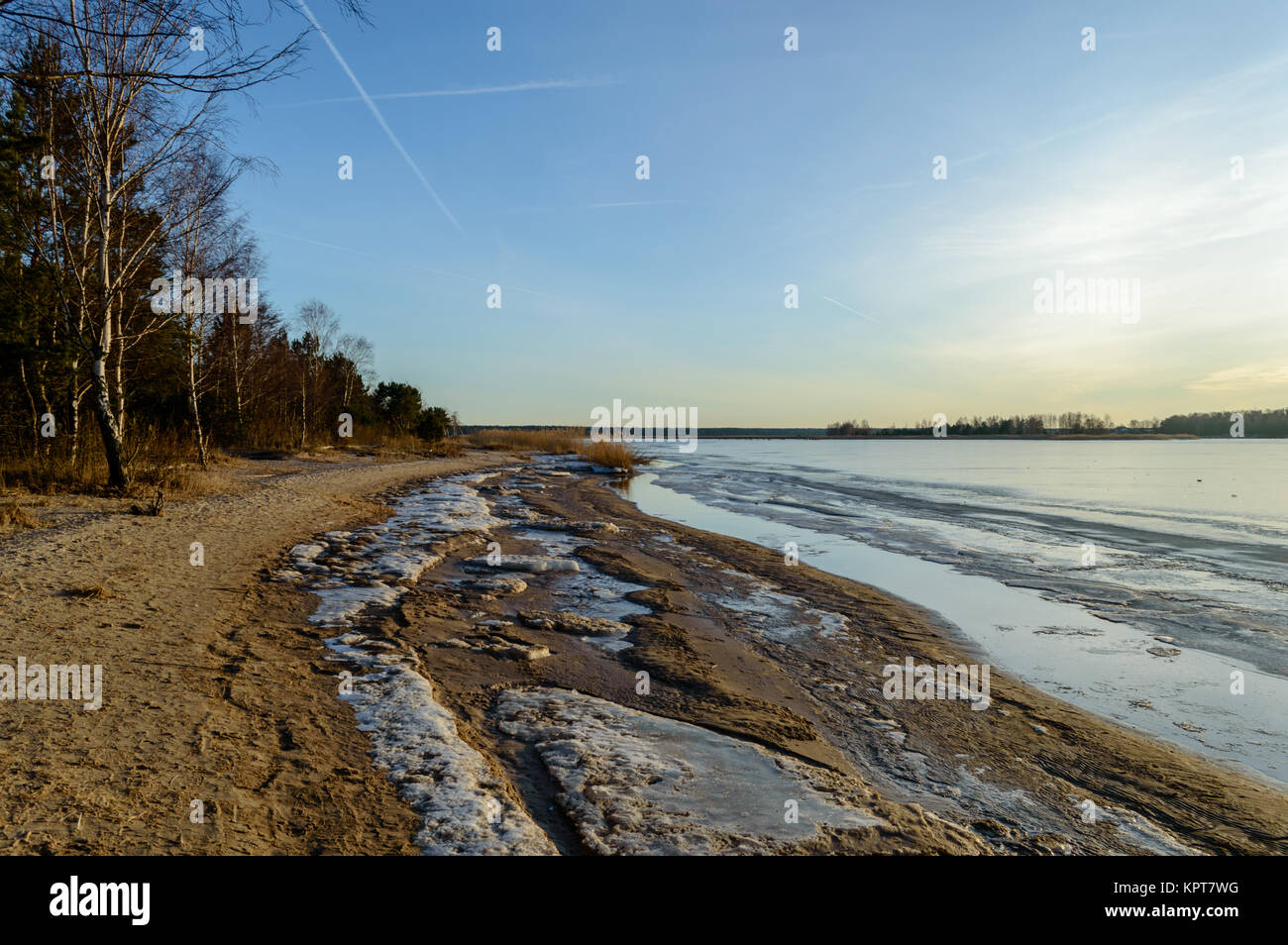 frozen beach in cold winters day with colorful sky and ice Stock Photo ...