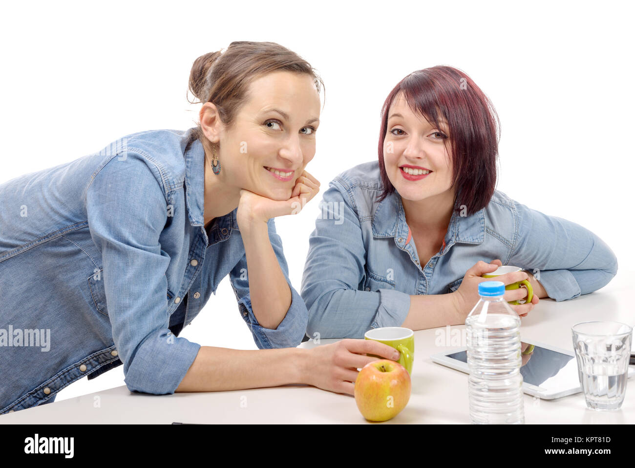 two female colleagues are making a coffee break Stock Photo - Alamy