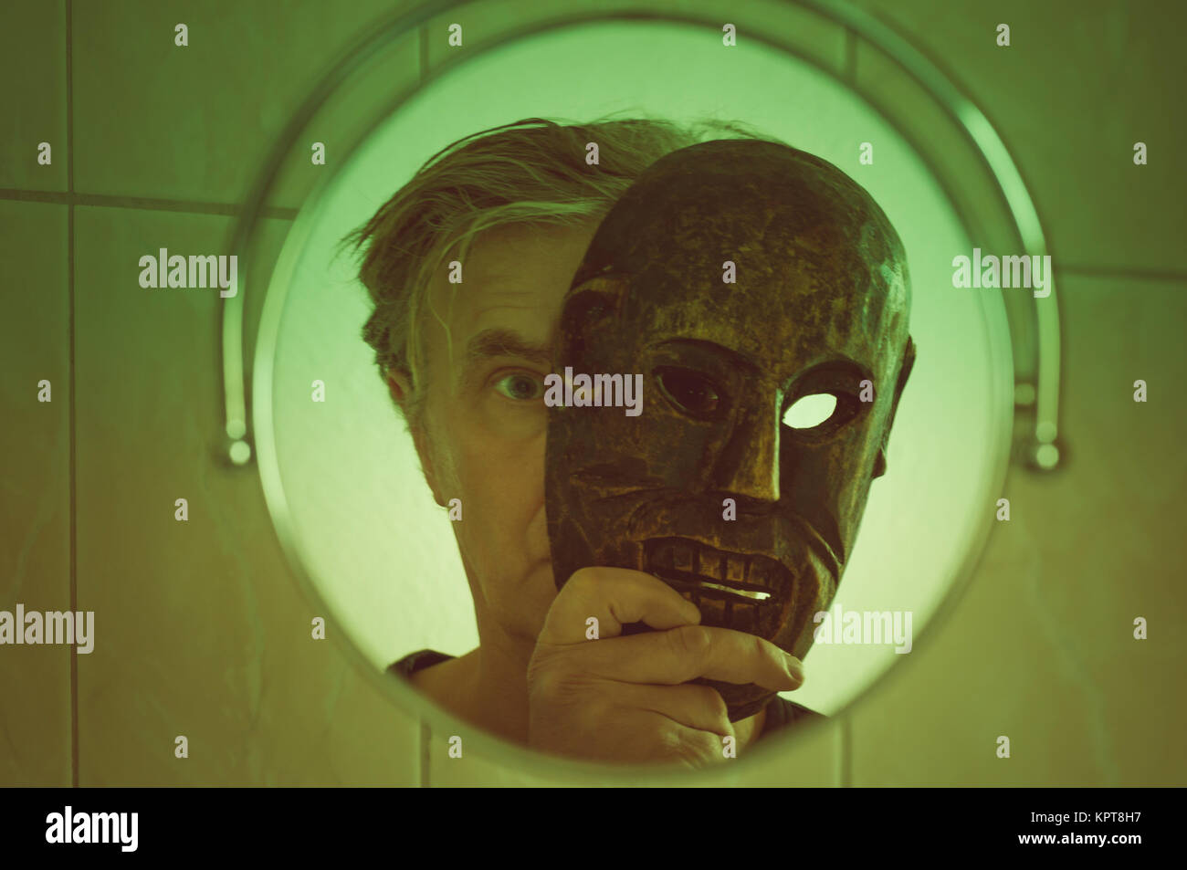 mirror image,man with mask Stock Photo - Alamy