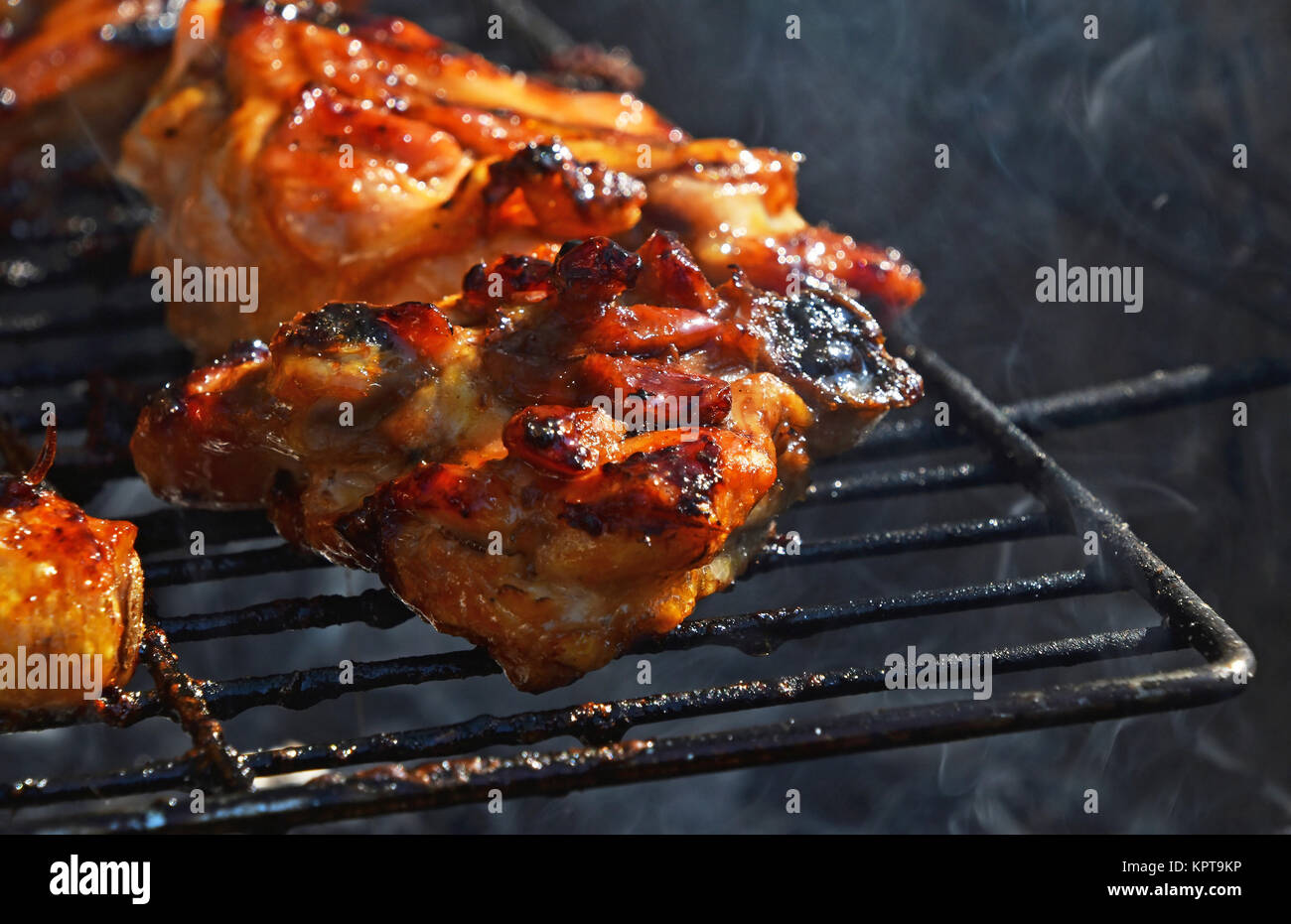 Barbecue chicken meat on grill Stock Photo - Alamy