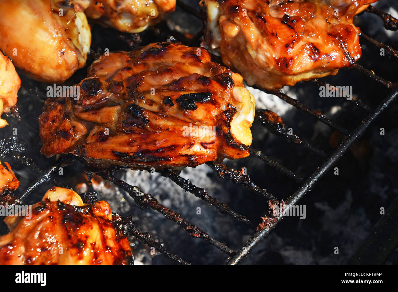Barbecue chicken meat on grill Stock Photo - Alamy
