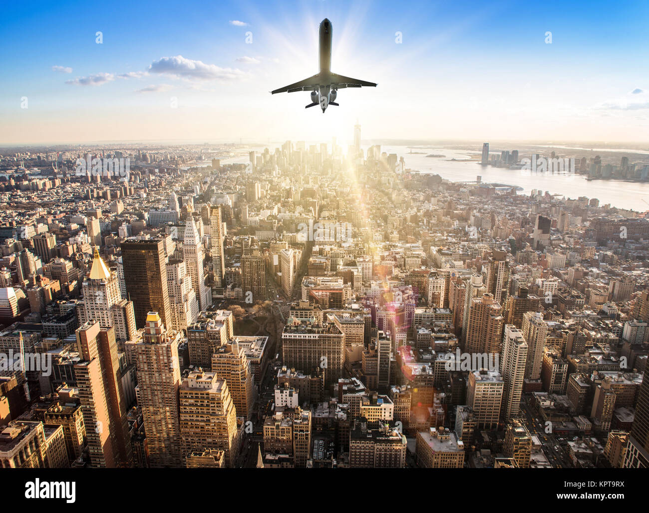 airplane over the skyline of new york Stock Photo - Alamy