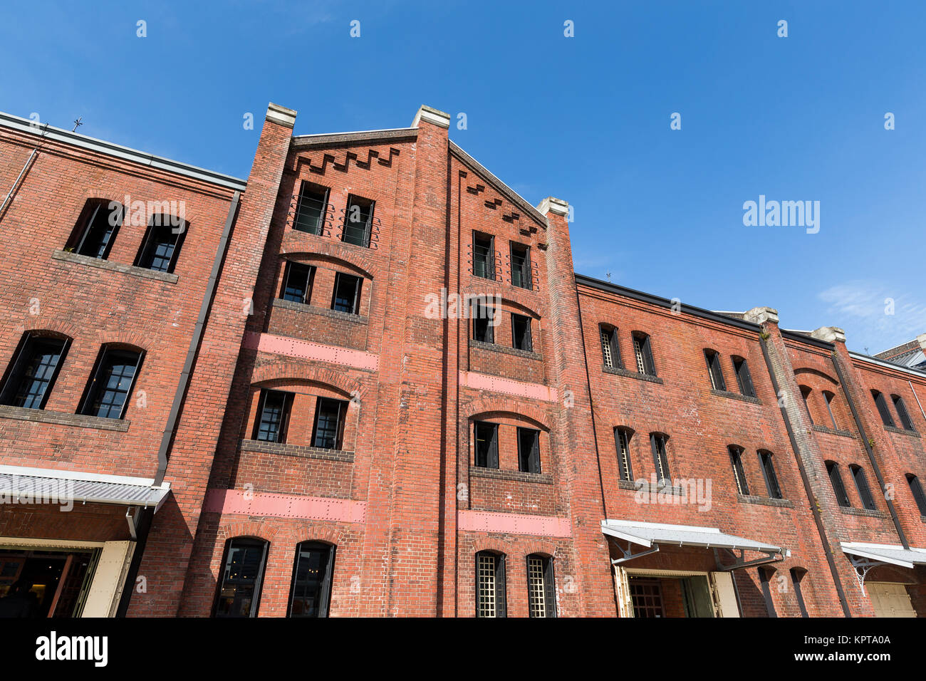 Red brick warehouse Stock Photo - Alamy