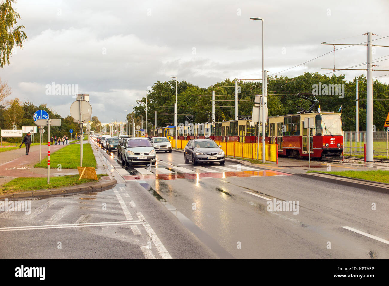 Street scene from the Polish city of Torun showing cars and trams near ...