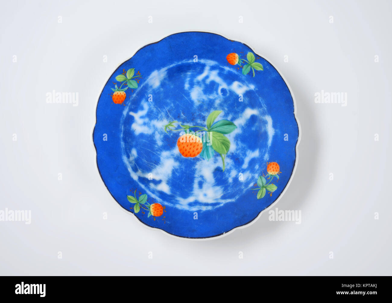 blue strawberry design plate with scalloped edge Stock Photo - Alamy