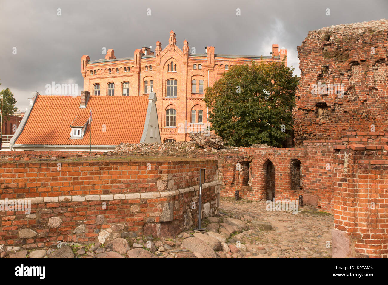 The city walls and remains of the medieval castle in the Polish city of ...