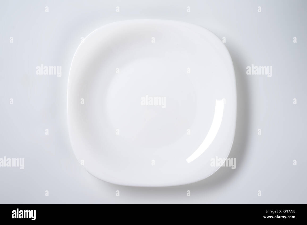 white square plate with rounded corners Stock Photo - Alamy