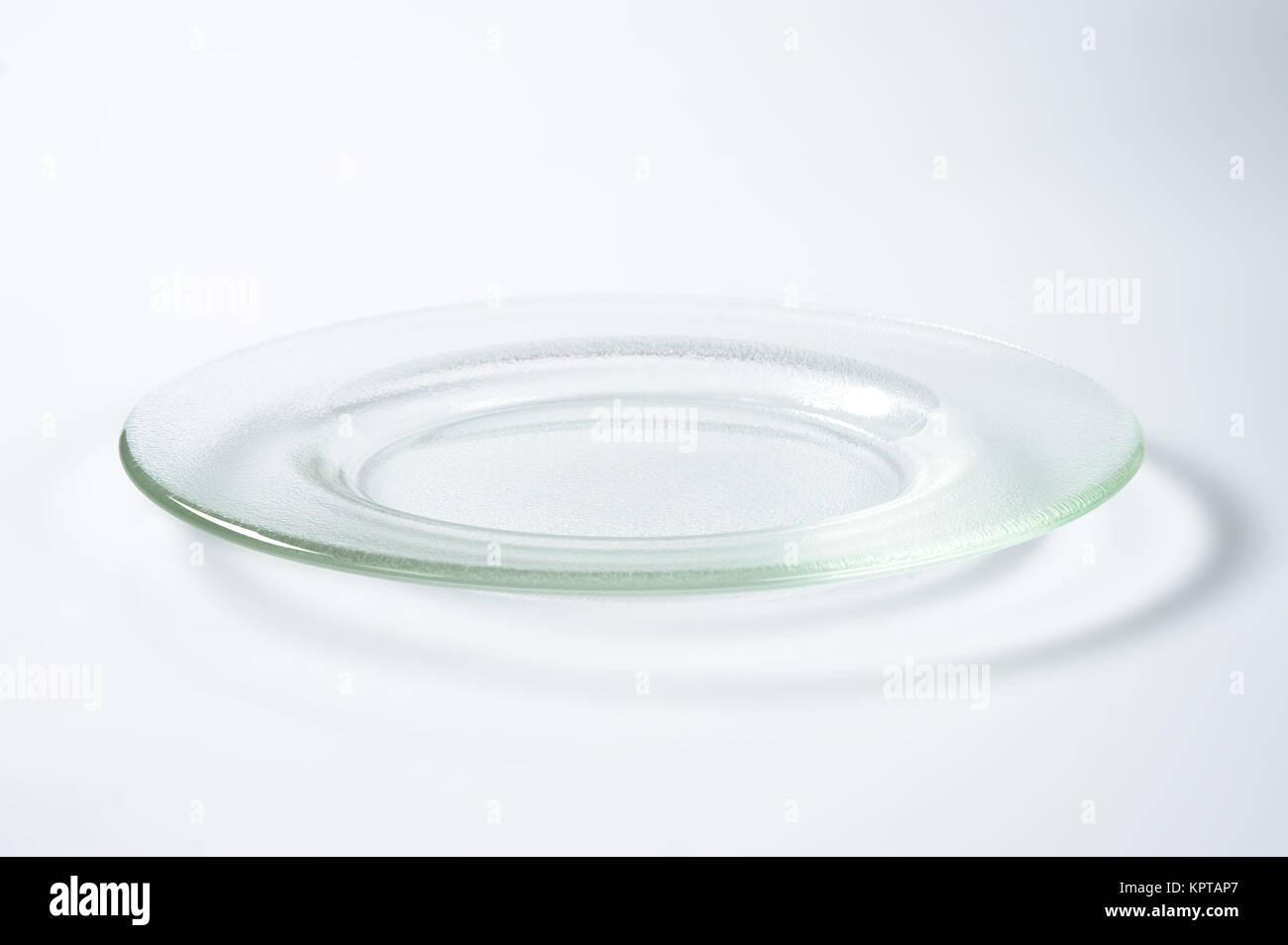 empty glass plate with wide rim Stock Photo - Alamy