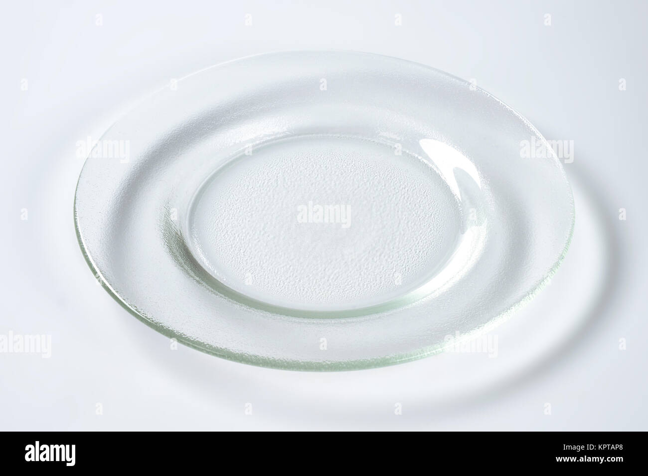 empty glass plate with wide rim Stock Photo - Alamy